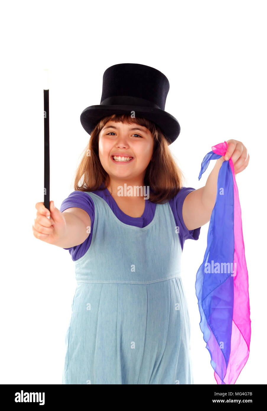 Pretty little girl doing magic with a top hat and a magic wand isolated ...