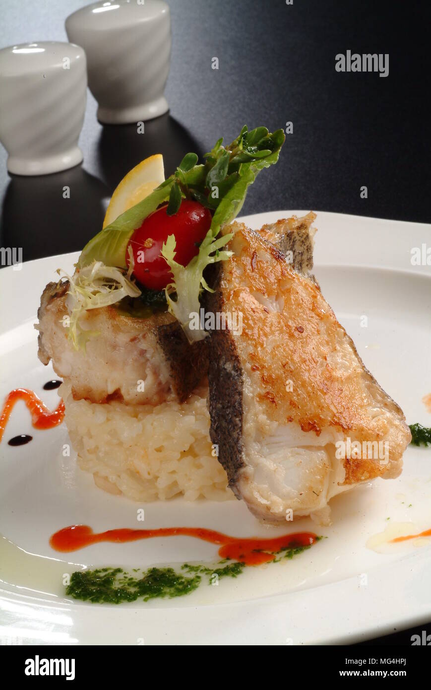 fish fillet with rice Stock Photo - Alamy