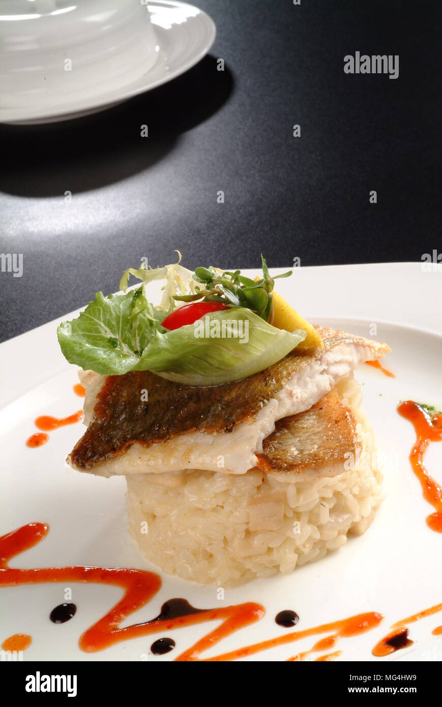 fish fillet with rice Stock Photo - Alamy