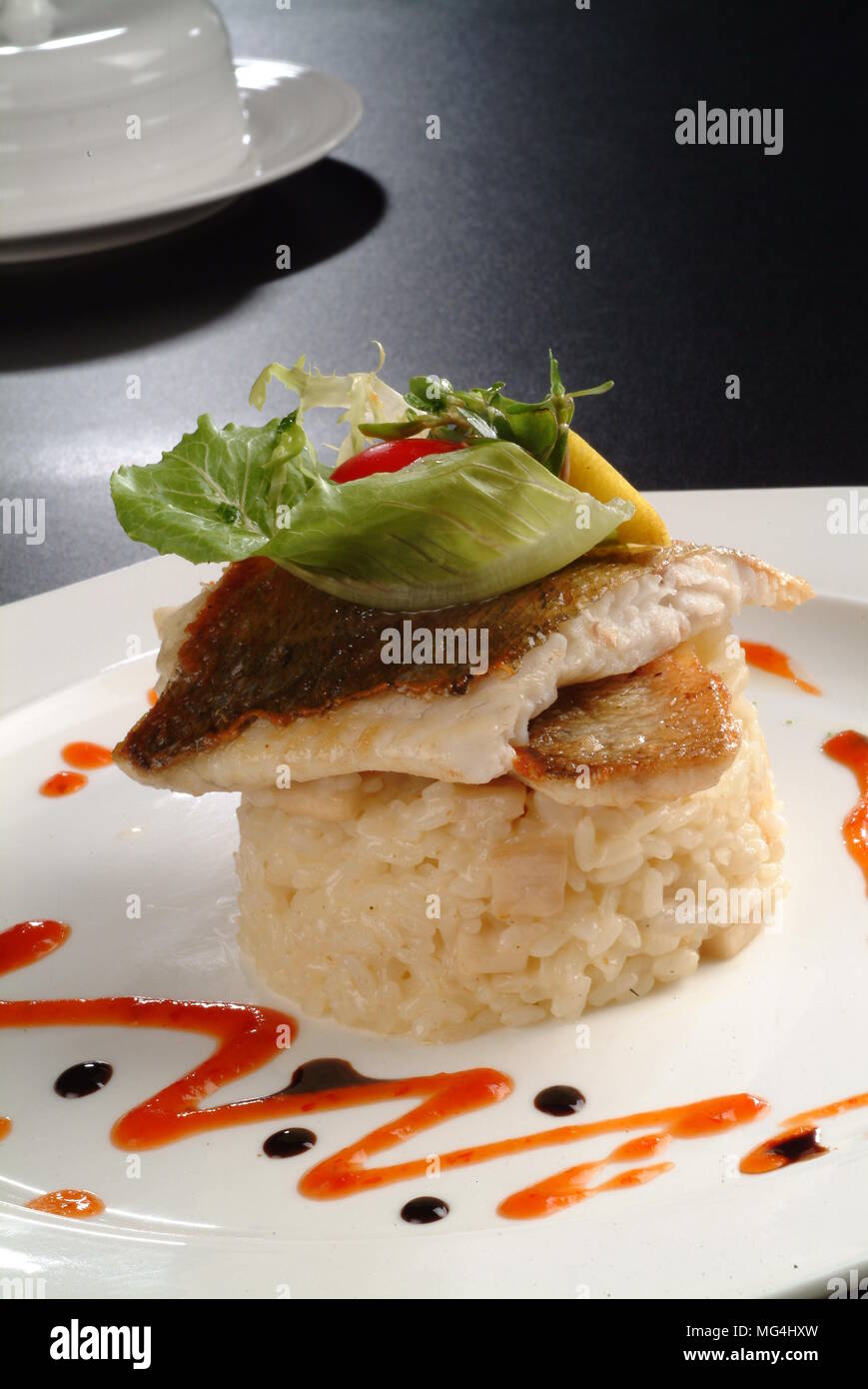fish fillet with rice Stock Photo - Alamy
