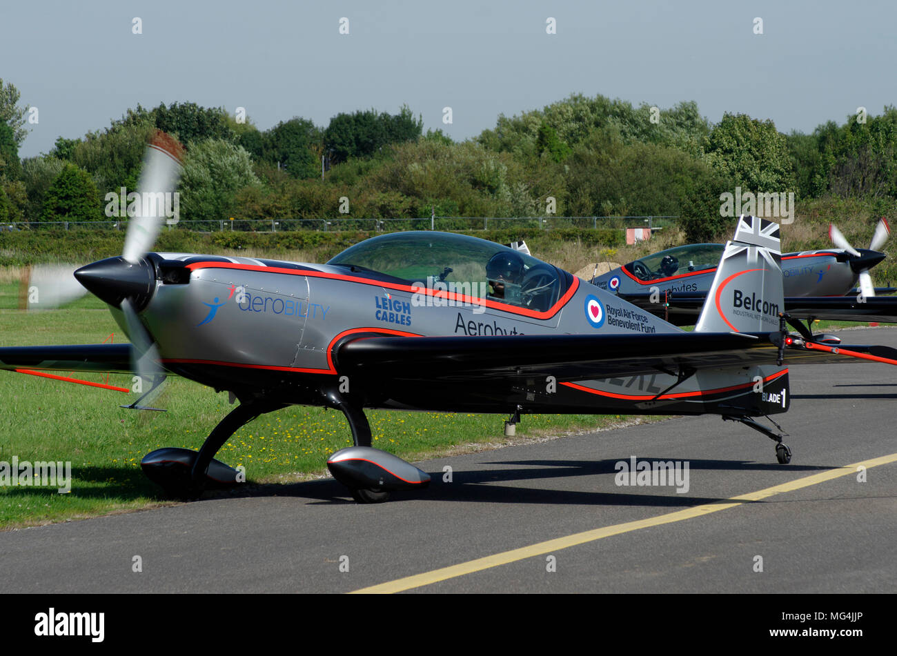 Blades Aerobatic Team Extra EA300 Stock Photo - Alamy