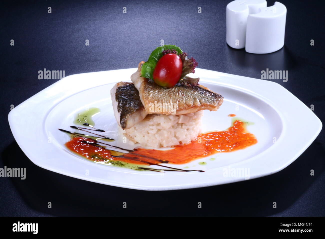 fish fillet with rice Stock Photo - Alamy