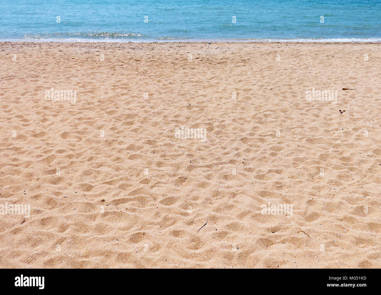 Beautiful sand beach with sea water Stock Photo - Alamy