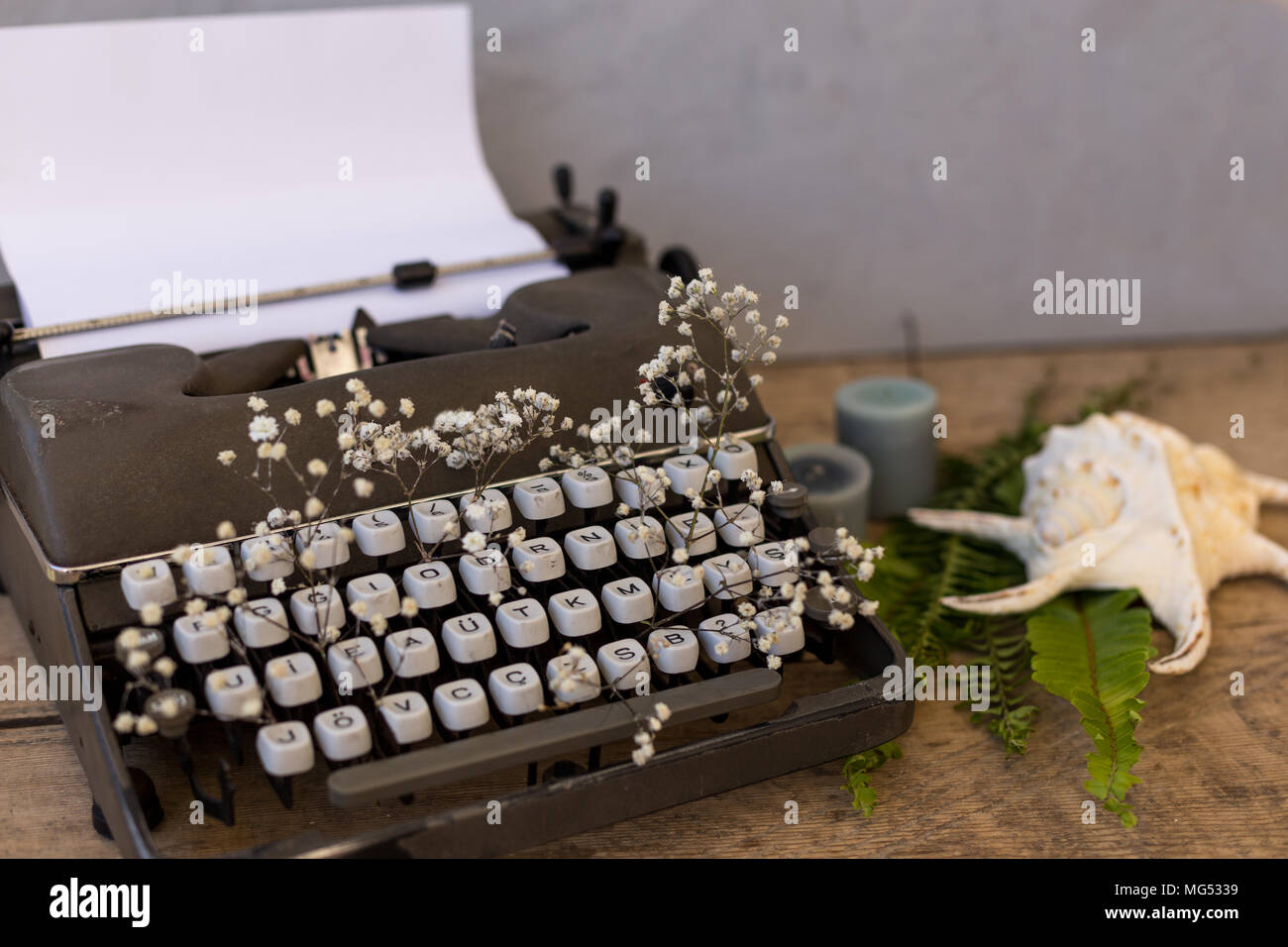Summer or spring writing and freelance concept. Vintage typewriter with ...
