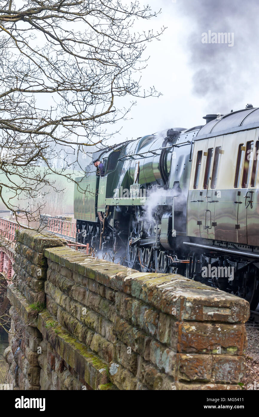 Portrait, side-view close up of vintage UK steam locomotive 34027 Taw ...