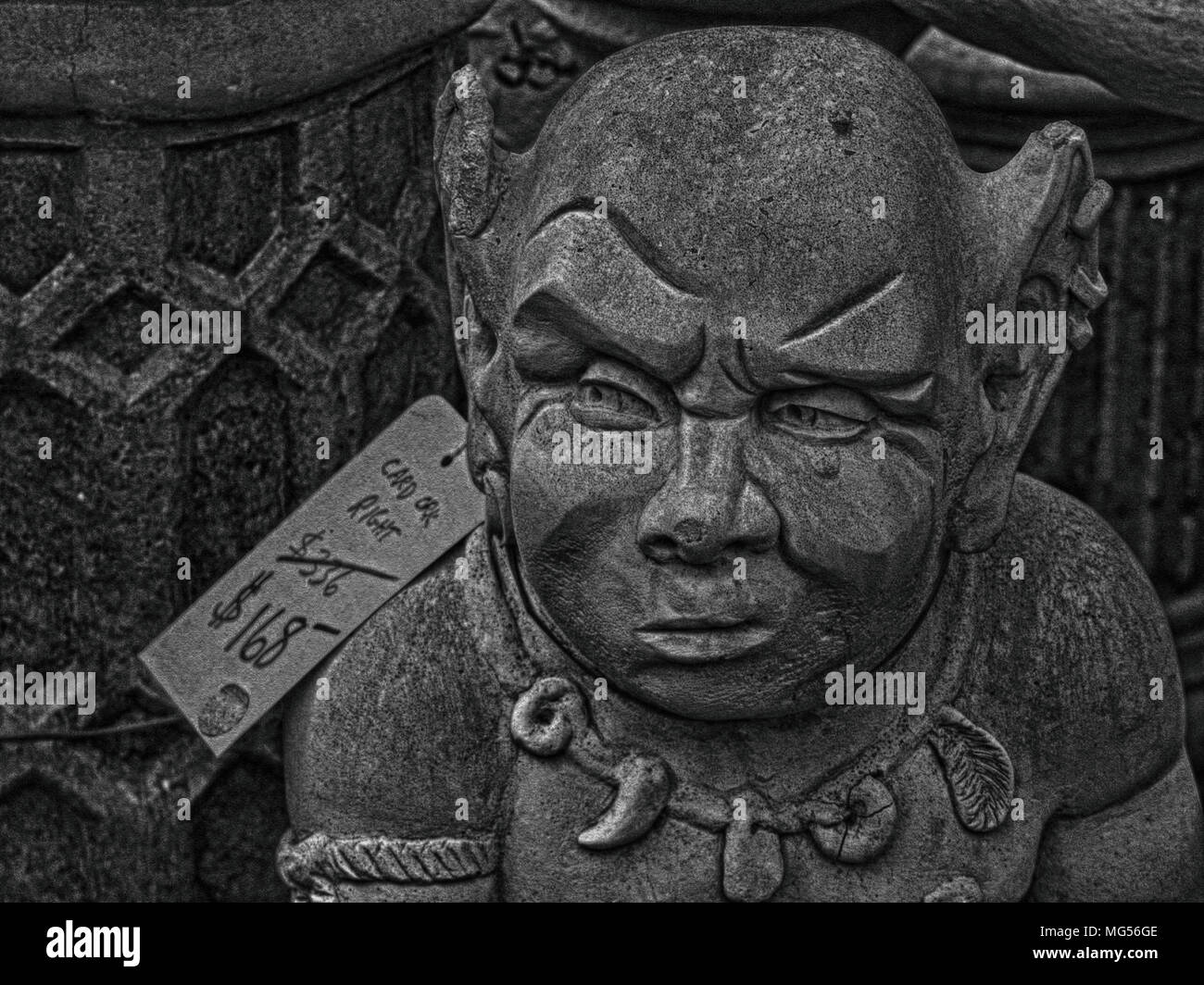 Stone statue of little orc Stock Photo - Alamy