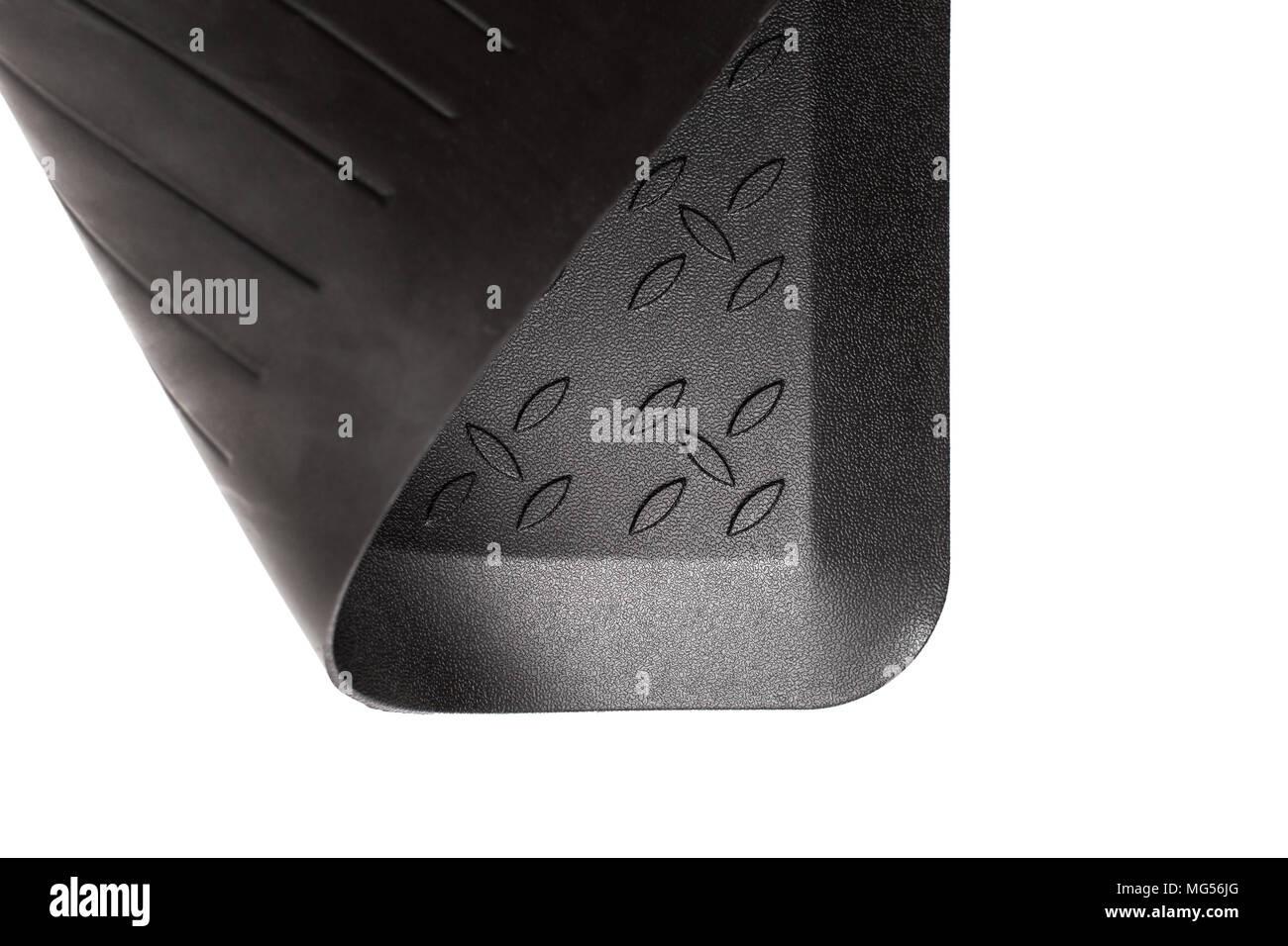 Rubber mat with folded corner on white background Stock Photo - Alamy