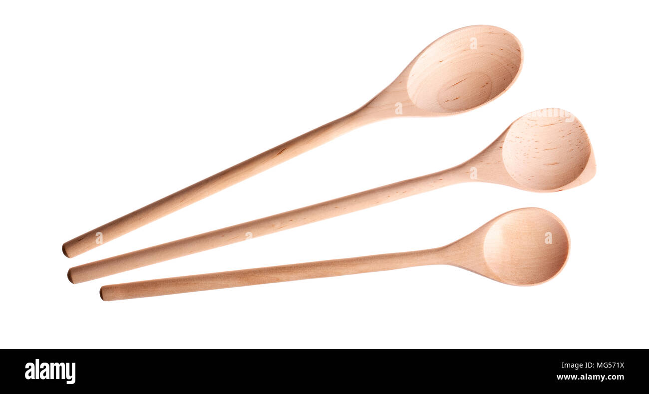 Three new wooden spoons, isolated on a white background. High ...