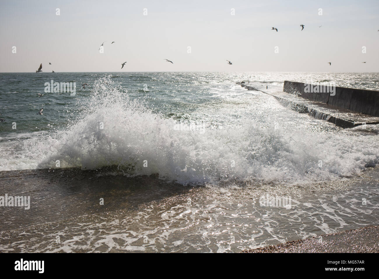 Splashing sea water on spring sunny windy stormy day. Horizontal color ...