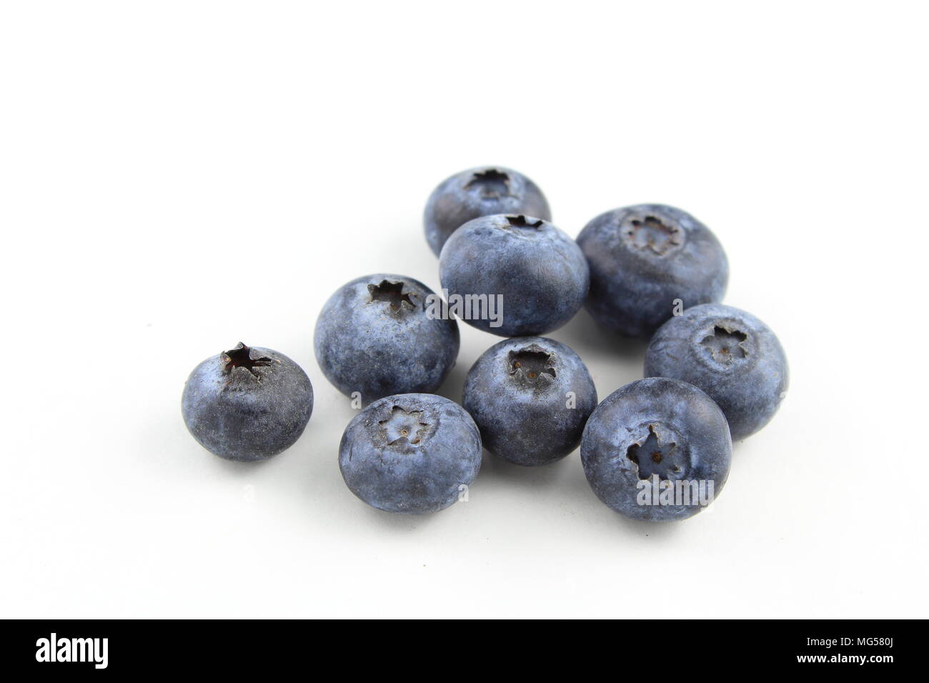 composition of fresh blueberry fruits isolated on a white background ...