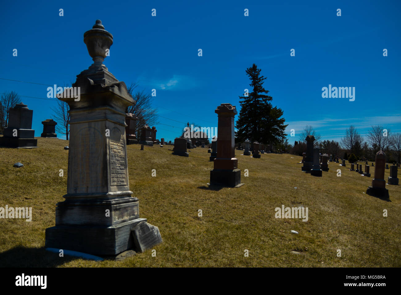 Cemetery Tomb Stones in Graveyard showing carvings on stone Stock Photo ...