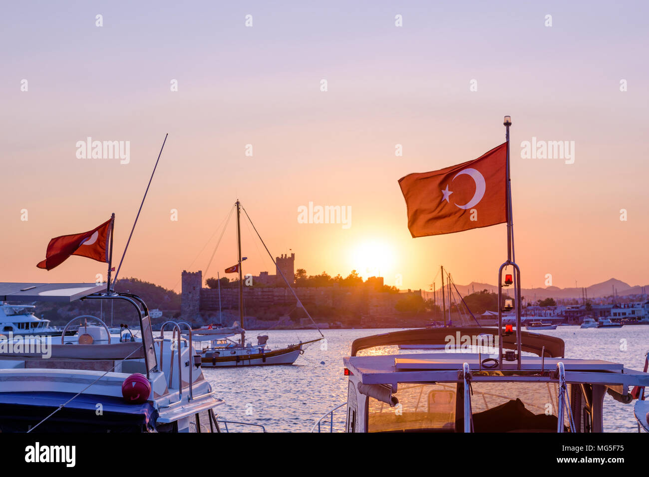 With Turkish flag on foreground,Sunset view of Bodrum Marine with ...