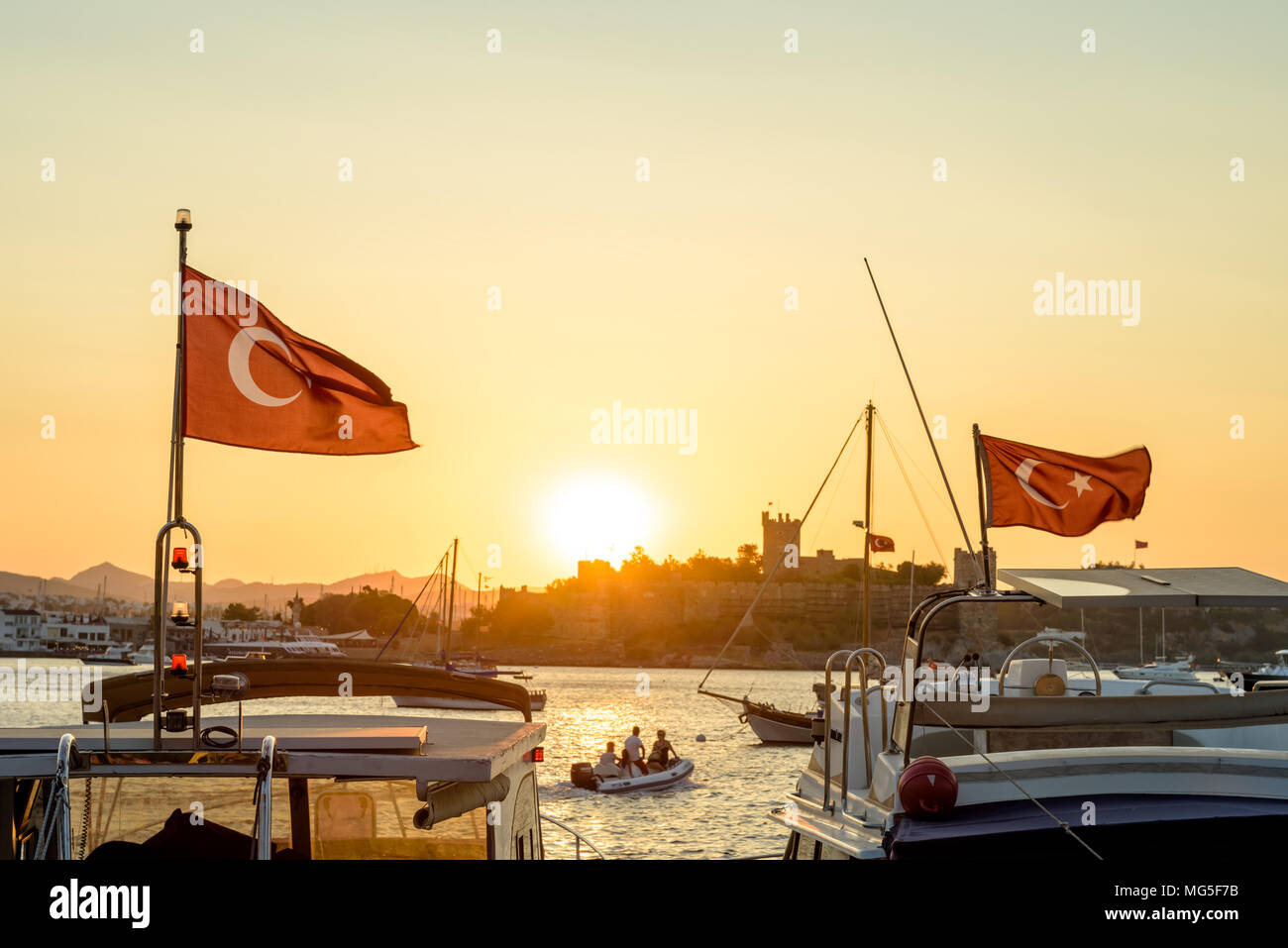With Turkish flag on foreground,Sunset view of Bodrum Marine with ...