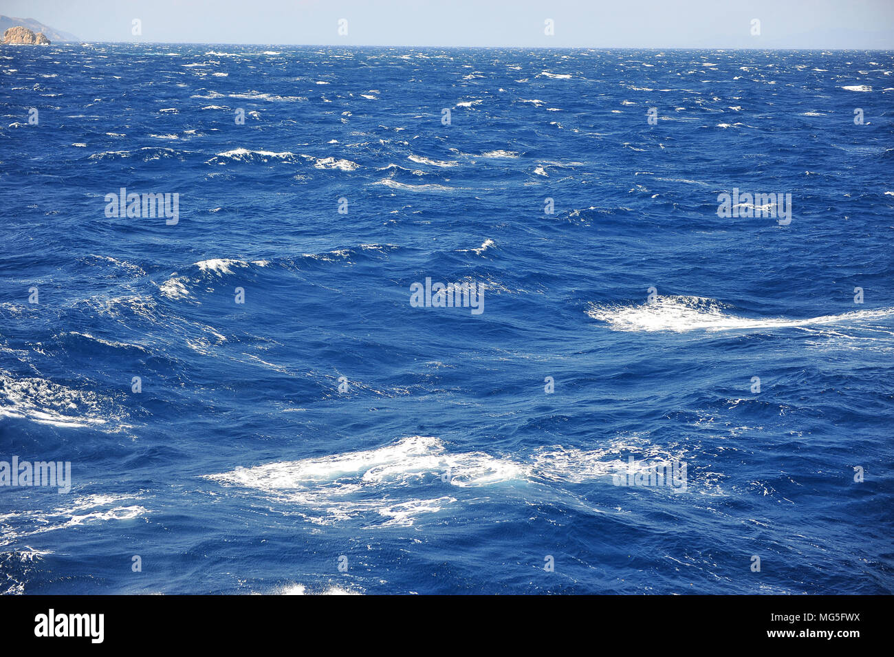 Blue waves in open sea background Stock Photo - Alamy