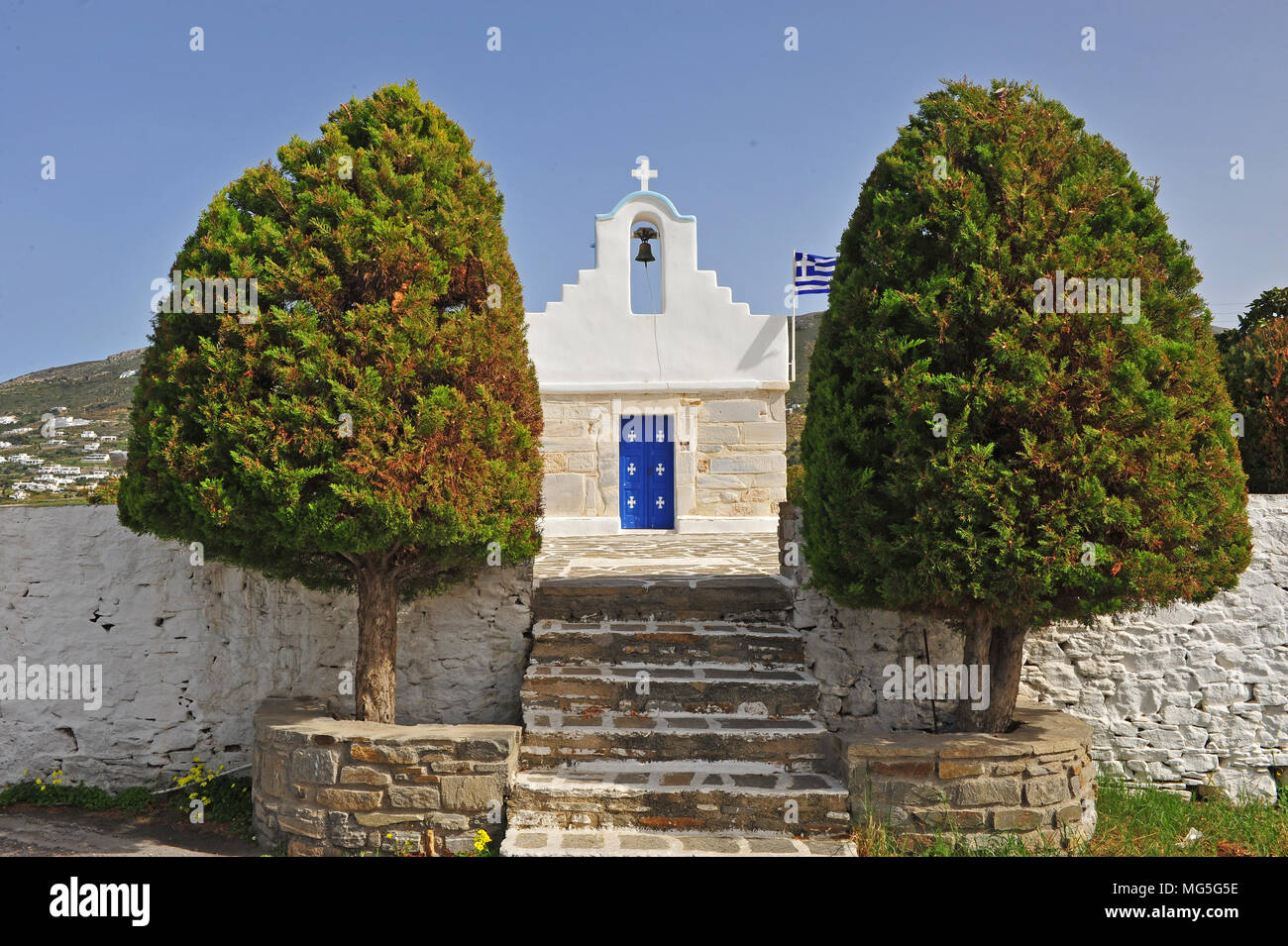 Old chapel and two trees in the park, Greece Stock Photo - Alamy