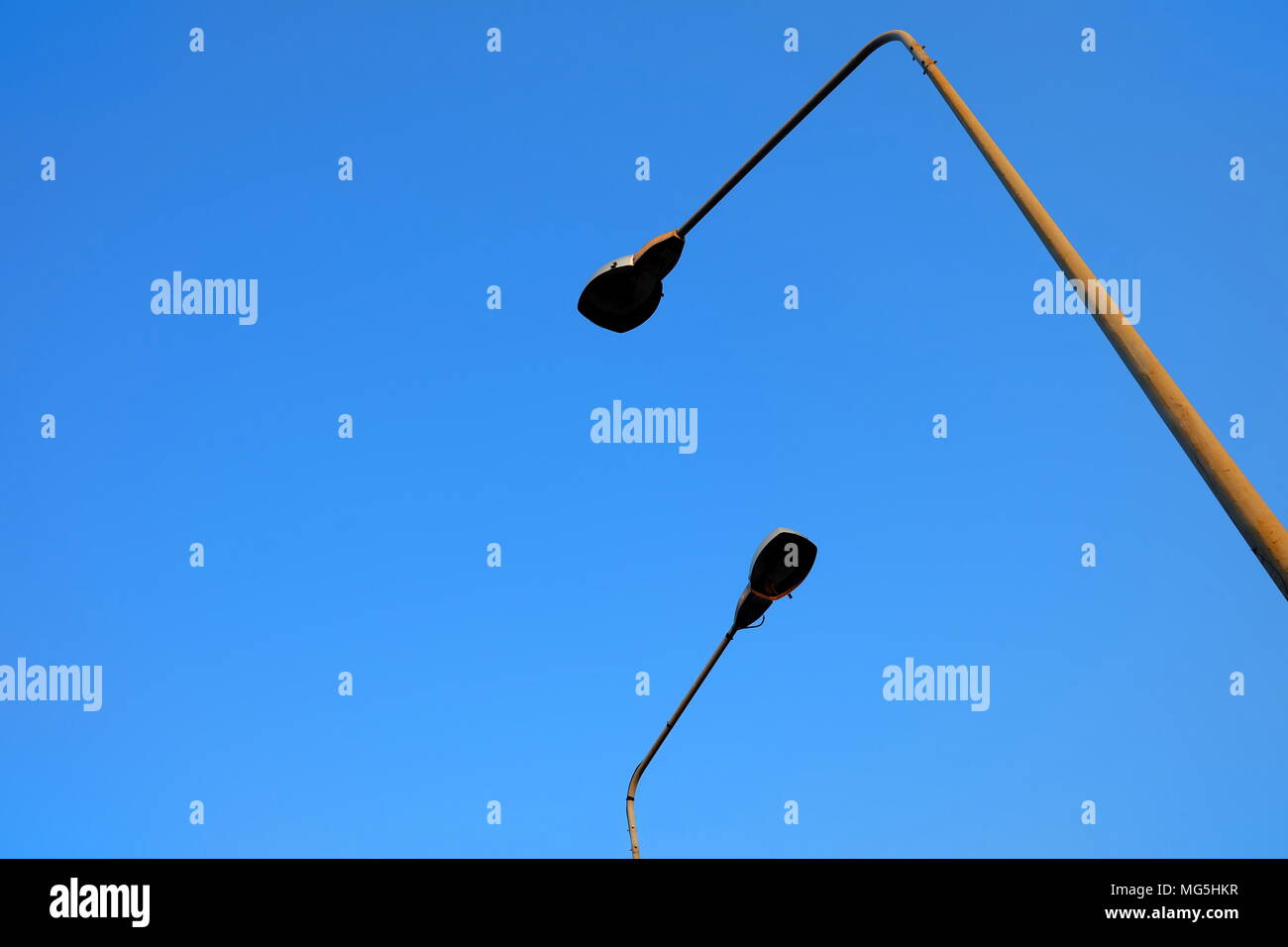 Street Lights with Blue Sky Background Stock Photo - Alamy