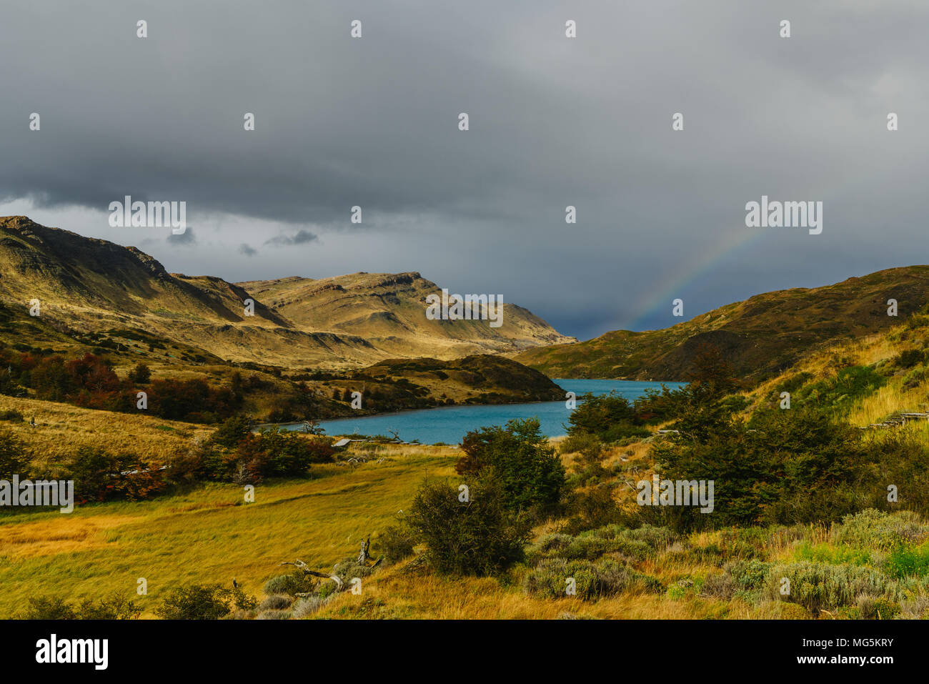 View of a lake and a rainbow in the Torres del Paine National Park on a ...