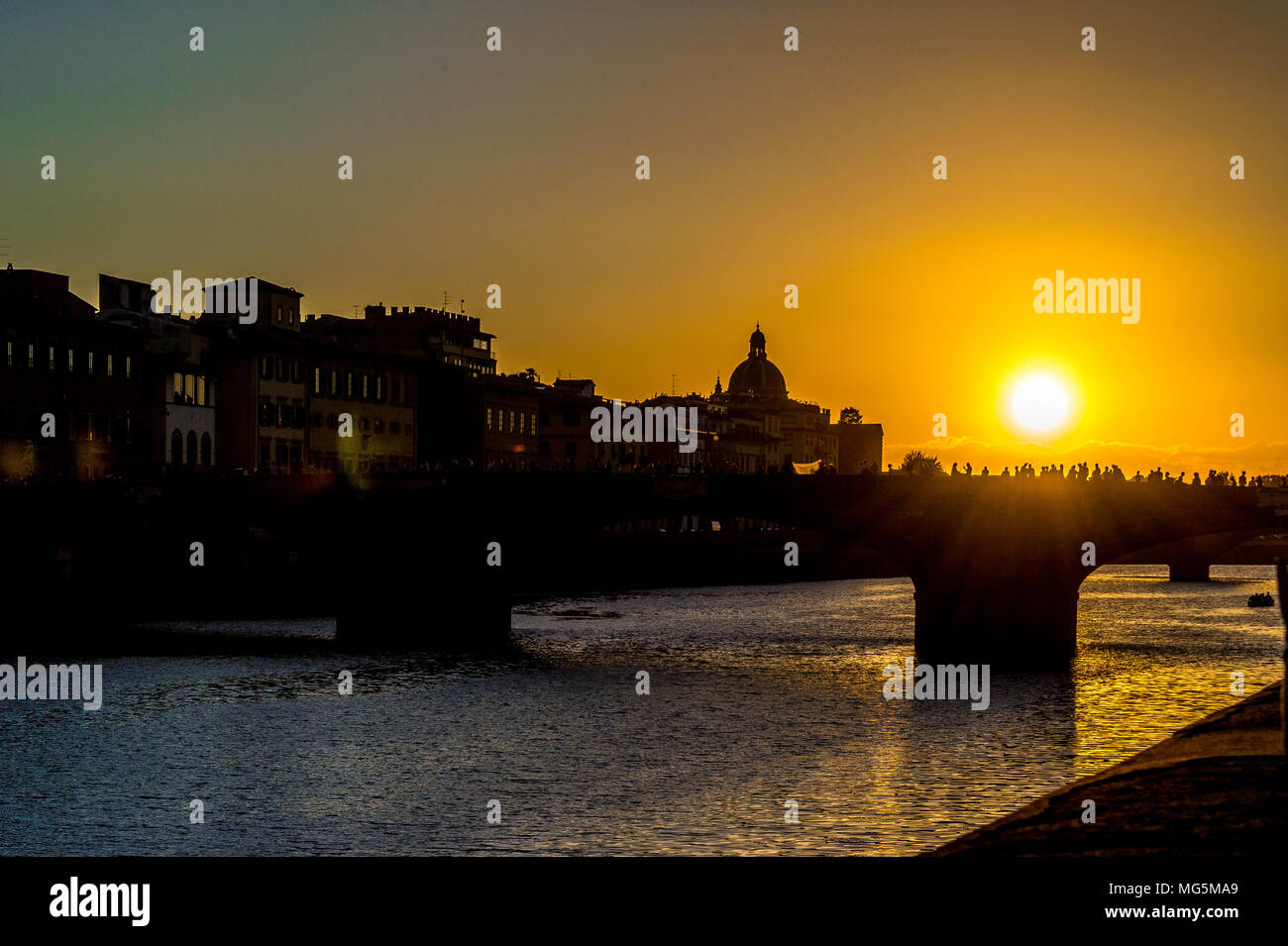 Sunset on the St Trinity Bridge, or Ponte Santa Trinita in Florence ...