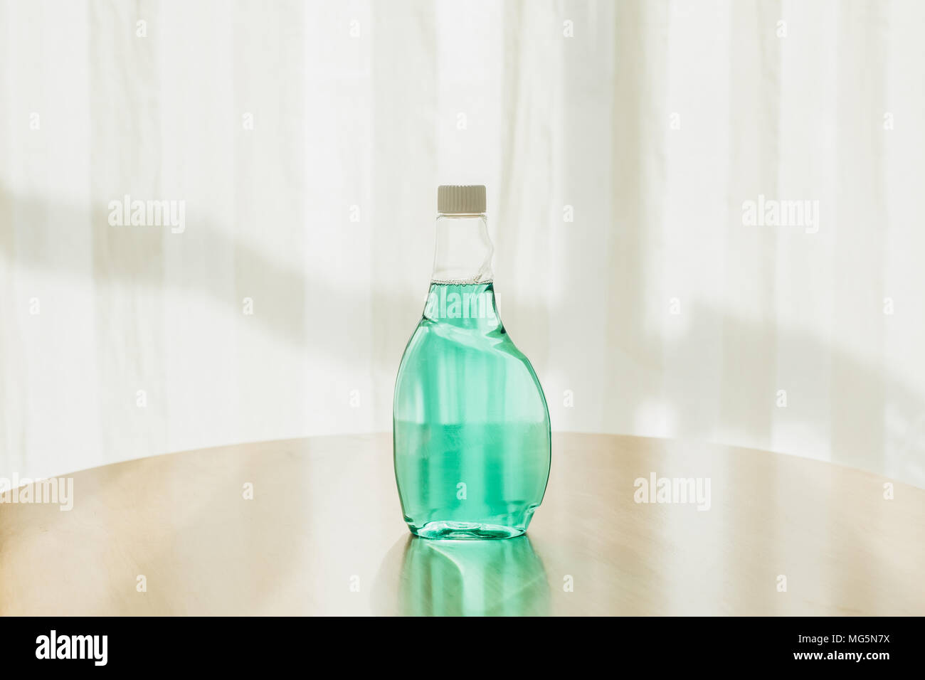Bottle of cleaning fluid Stock Photo - Alamy