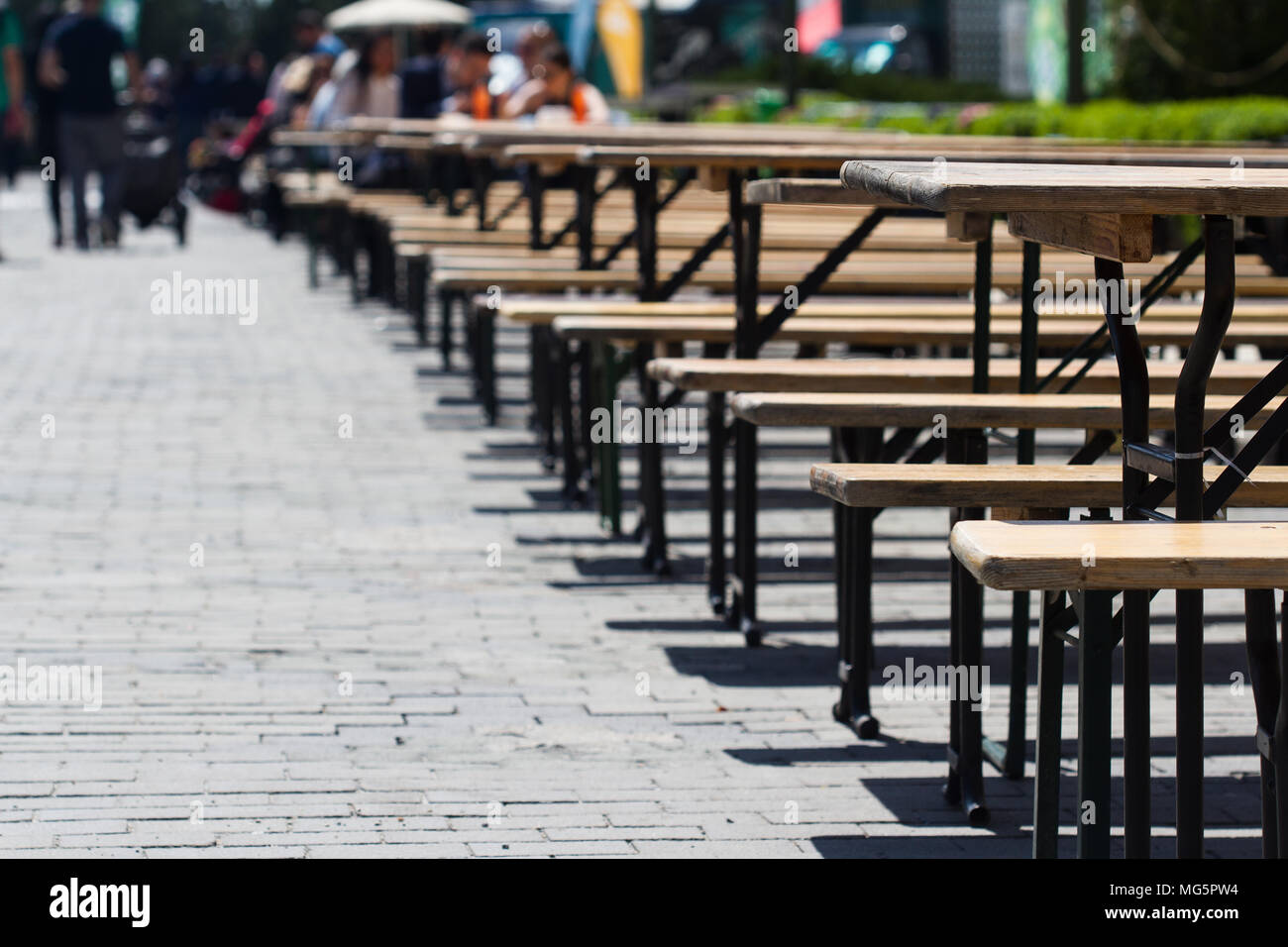 horizontal view row of empty restaurant terrace tables outdoor setting ...