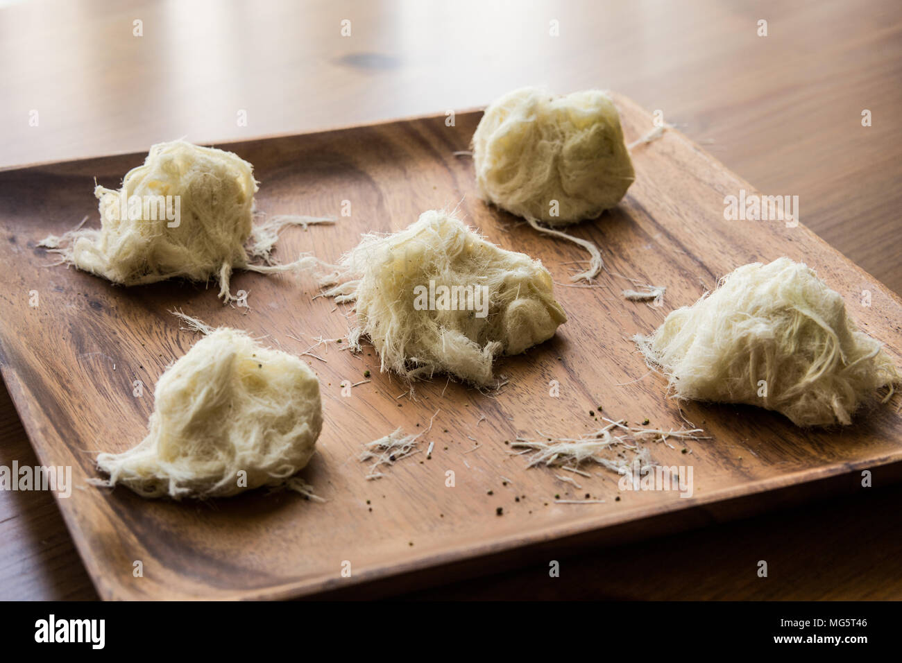 Pismaniye is a Turkish sweet in fine strands made by blending flour ...