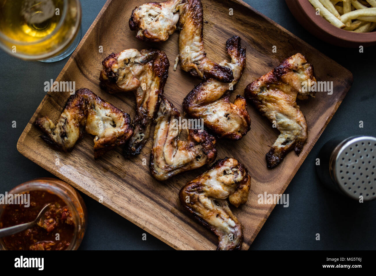 A type of food, a serving of the wing sections of a chicken, deep fried ...