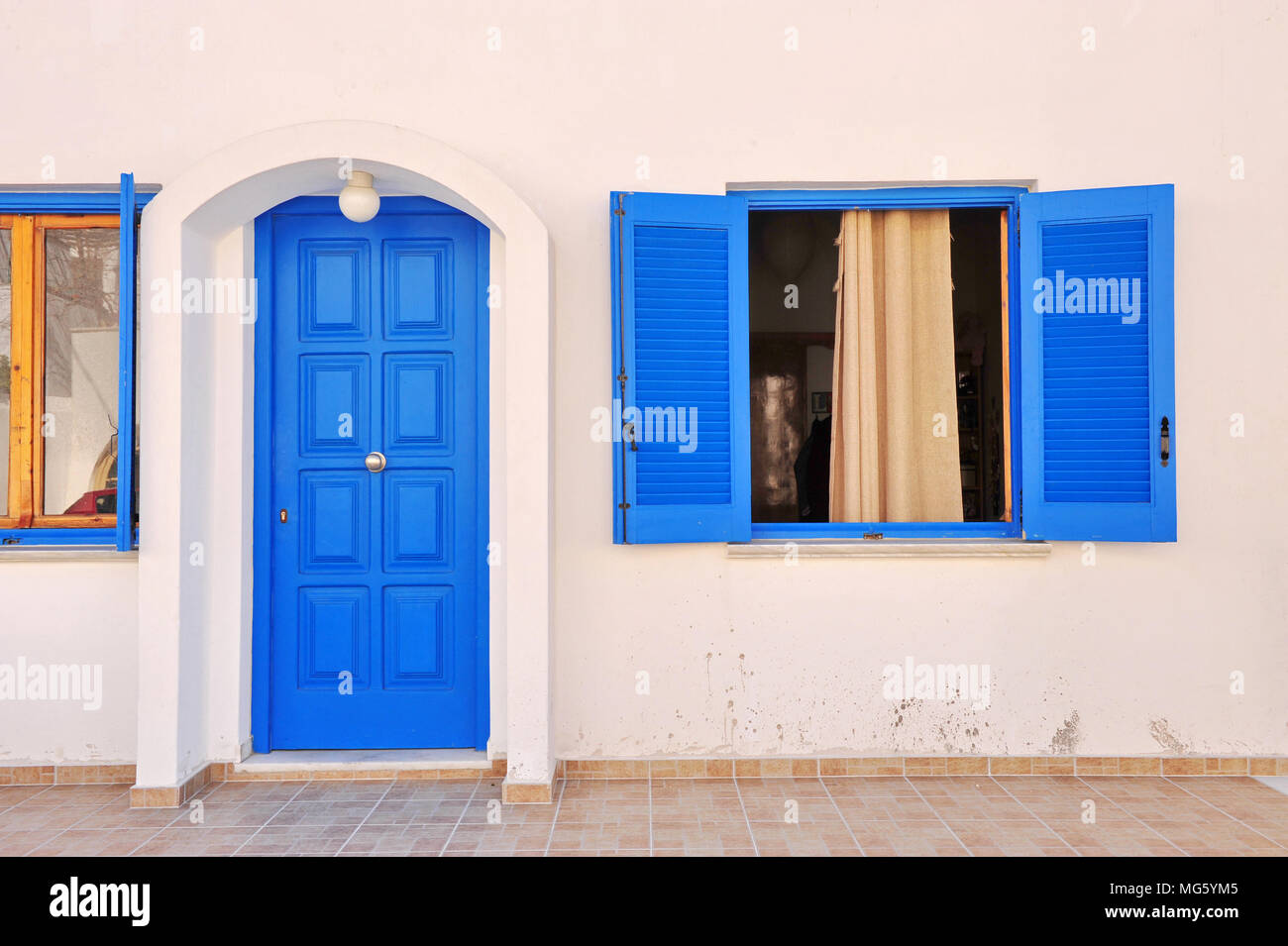 Traditional greek house in blue white colours Stock Photo - Alamy