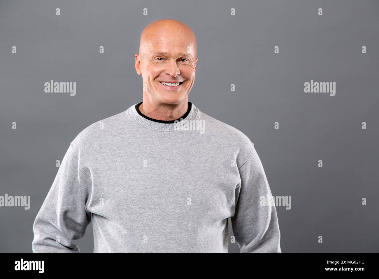 Smiling brutal masculine man hi-res stock photography and images - Alamy