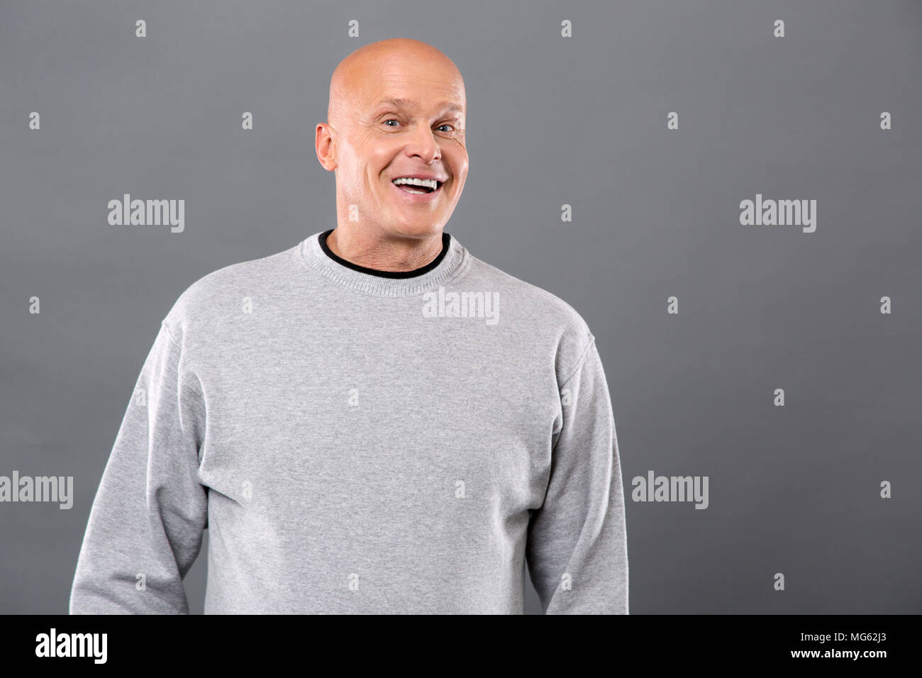 Happy positive man being in a good mood Stock Photo - Alamy