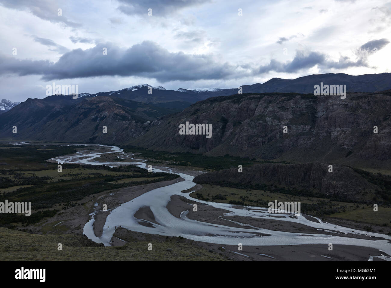 Argentinian Patagonia landscape. River flowing and mountain range in ...