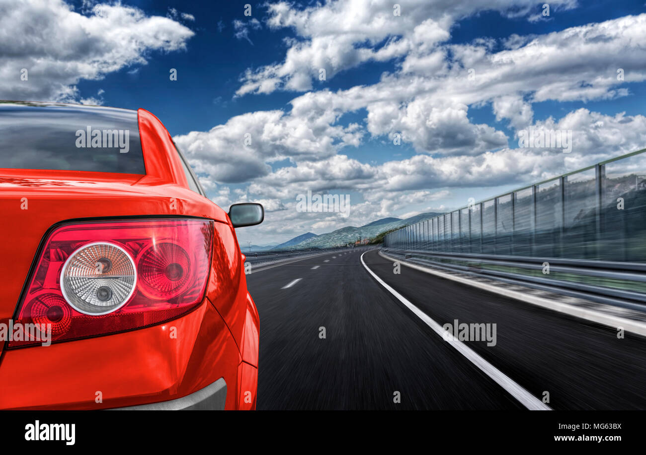 Car rushing along a high-speed highway Stock Photo - Alamy