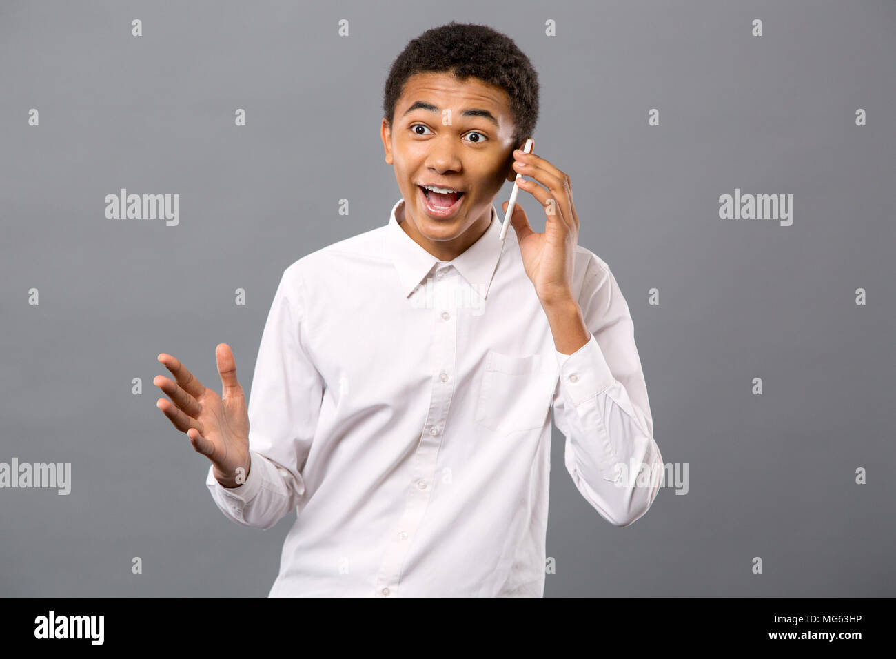 Joyful emotional man being surprised Stock Photo - Alamy