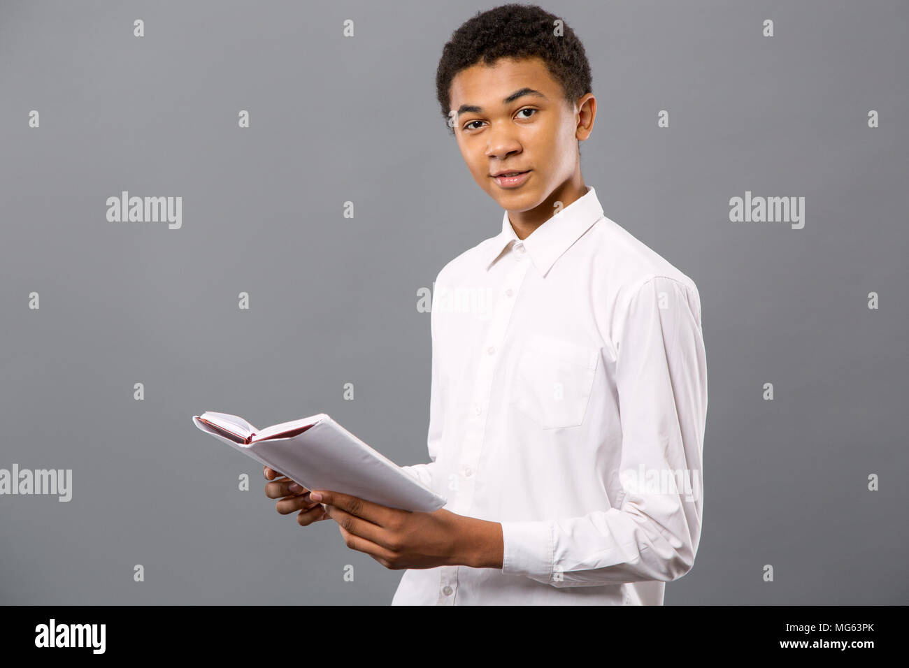 Serious young multiethnic male hi-res stock photography and images - Alamy