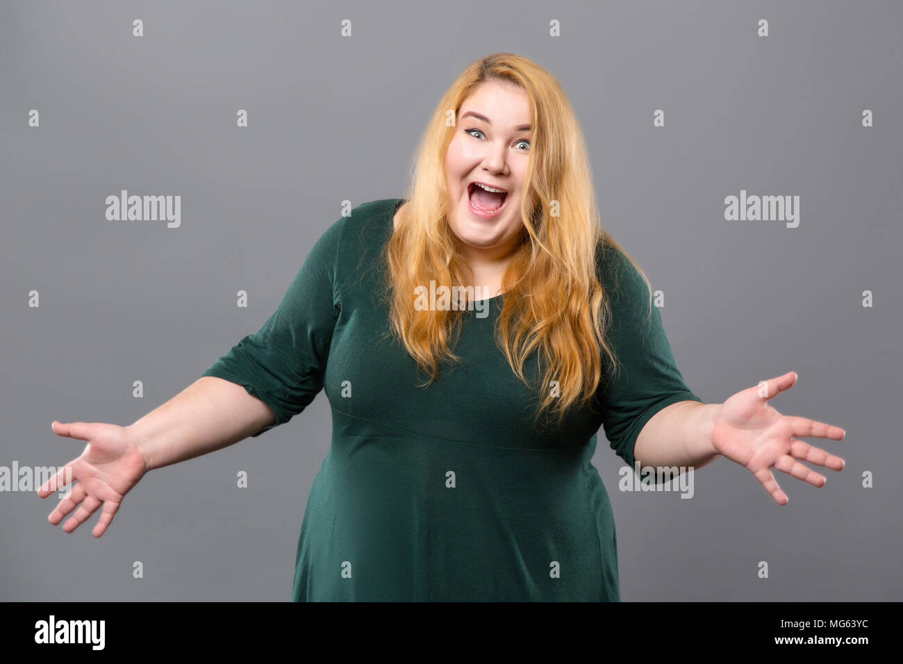 Positive obese woman smiling Stock Photo - Alamy