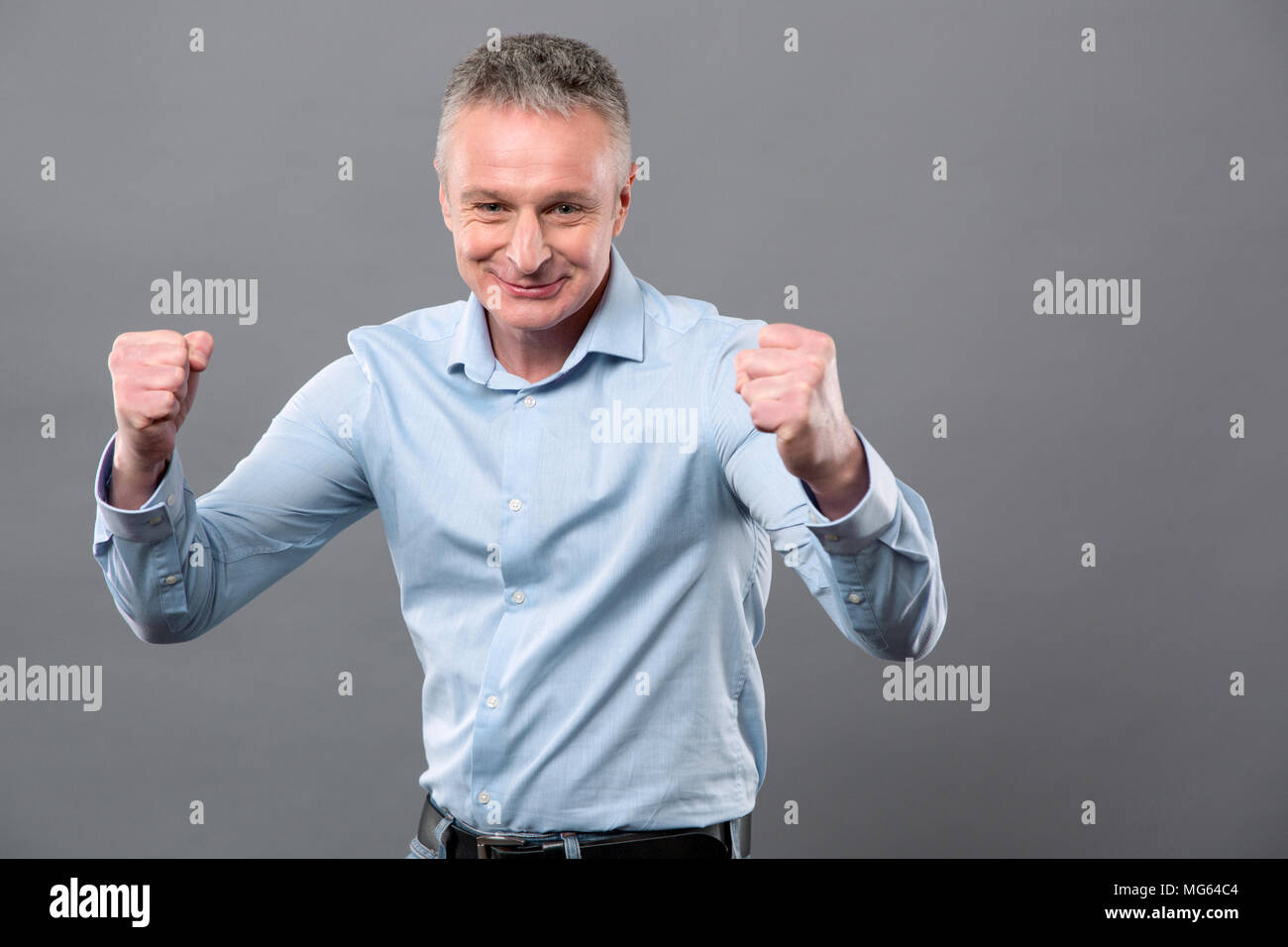 Handsome businessman feeling good hi-res stock photography and images ...