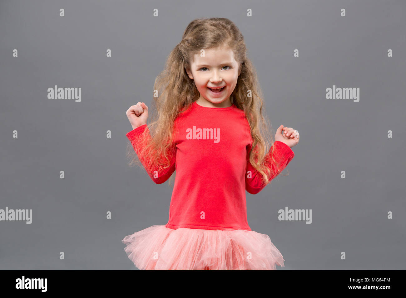 Joyful cute girl feeling happy Stock Photo - Alamy