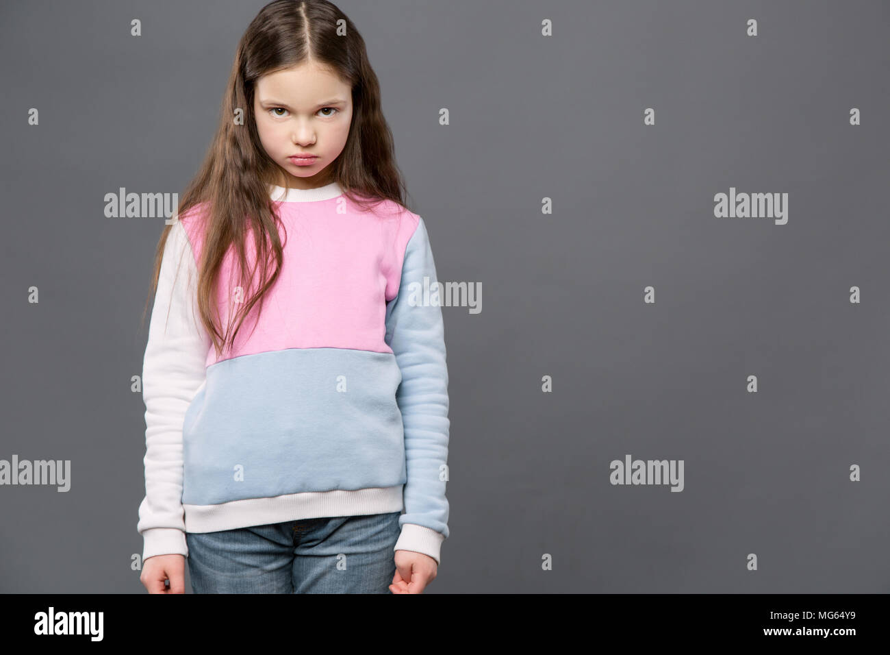 Nice gloomy girl looking at you Stock Photo - Alamy