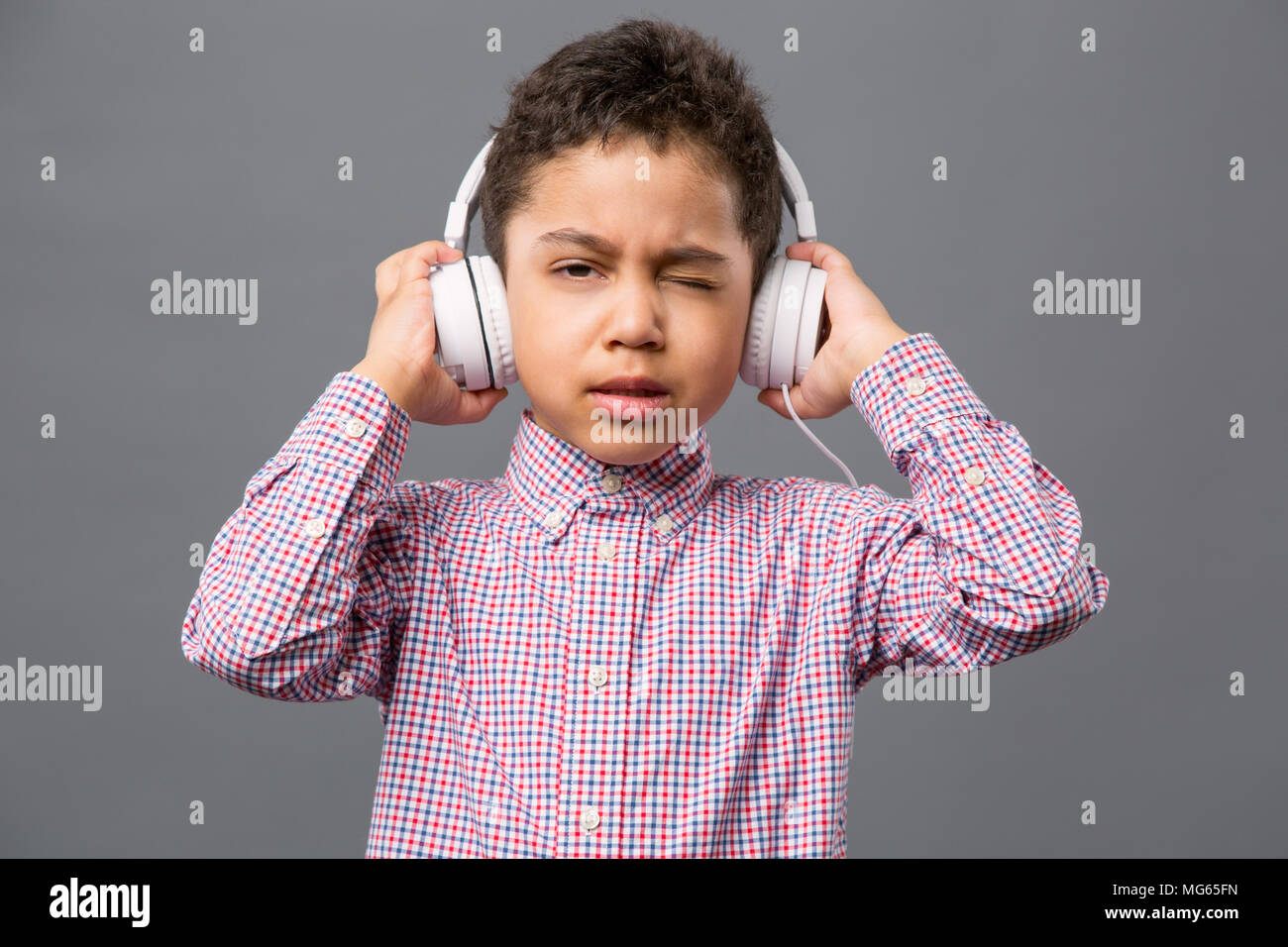 Cute nice boy wearing headphones Stock Photo - Alamy
