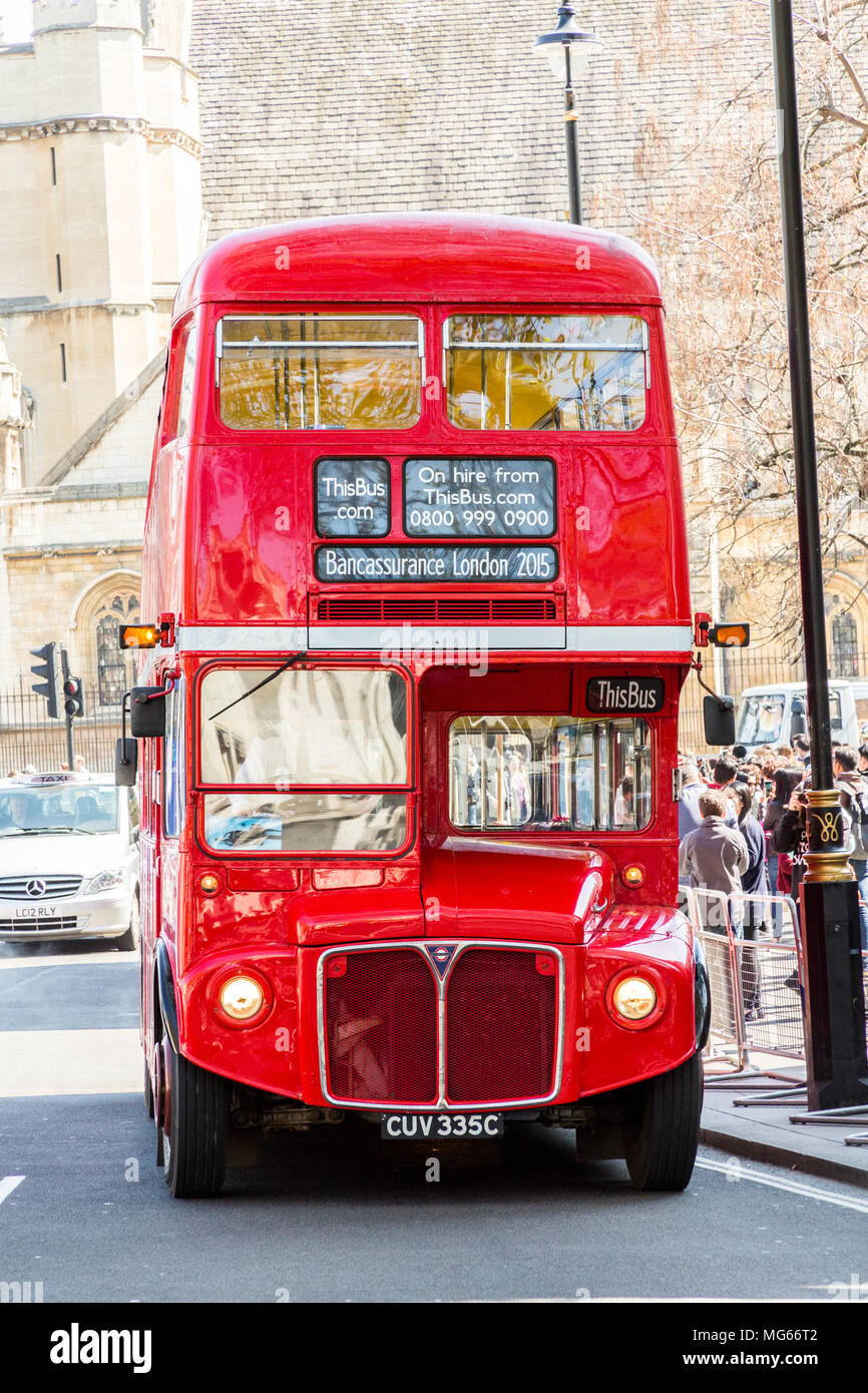 London, United Kingdom - April 23, 2015: A fire engine red double ...