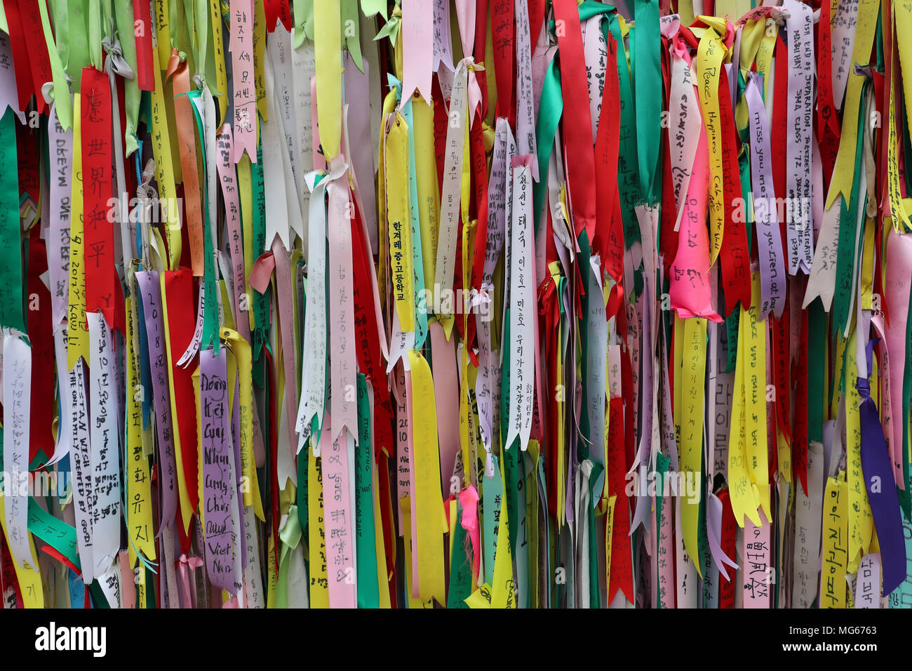 Hundreds of colorful ribbons with family messages, wishes and ...