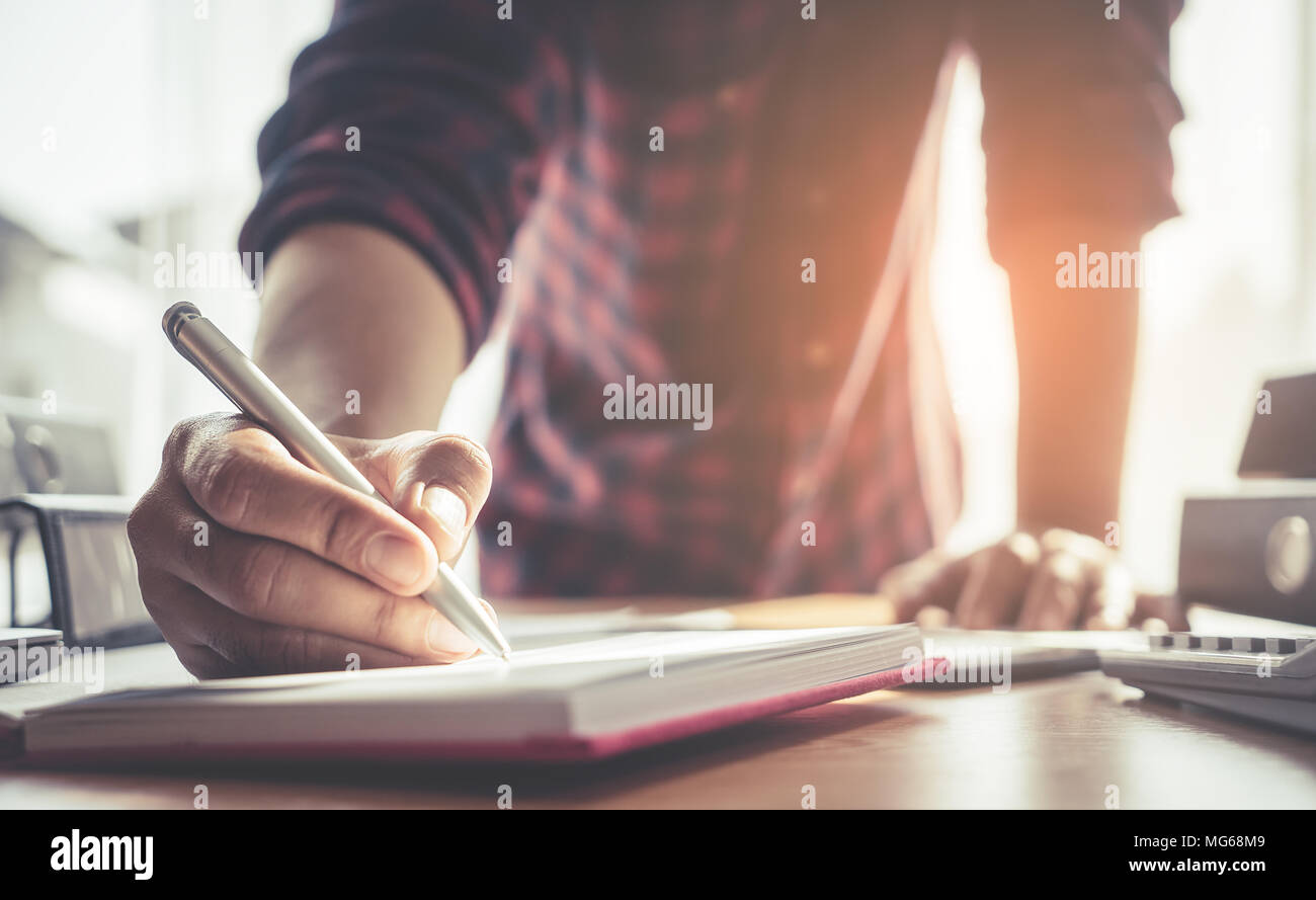 Student hand writing a report hi-res stock photography and images - Alamy