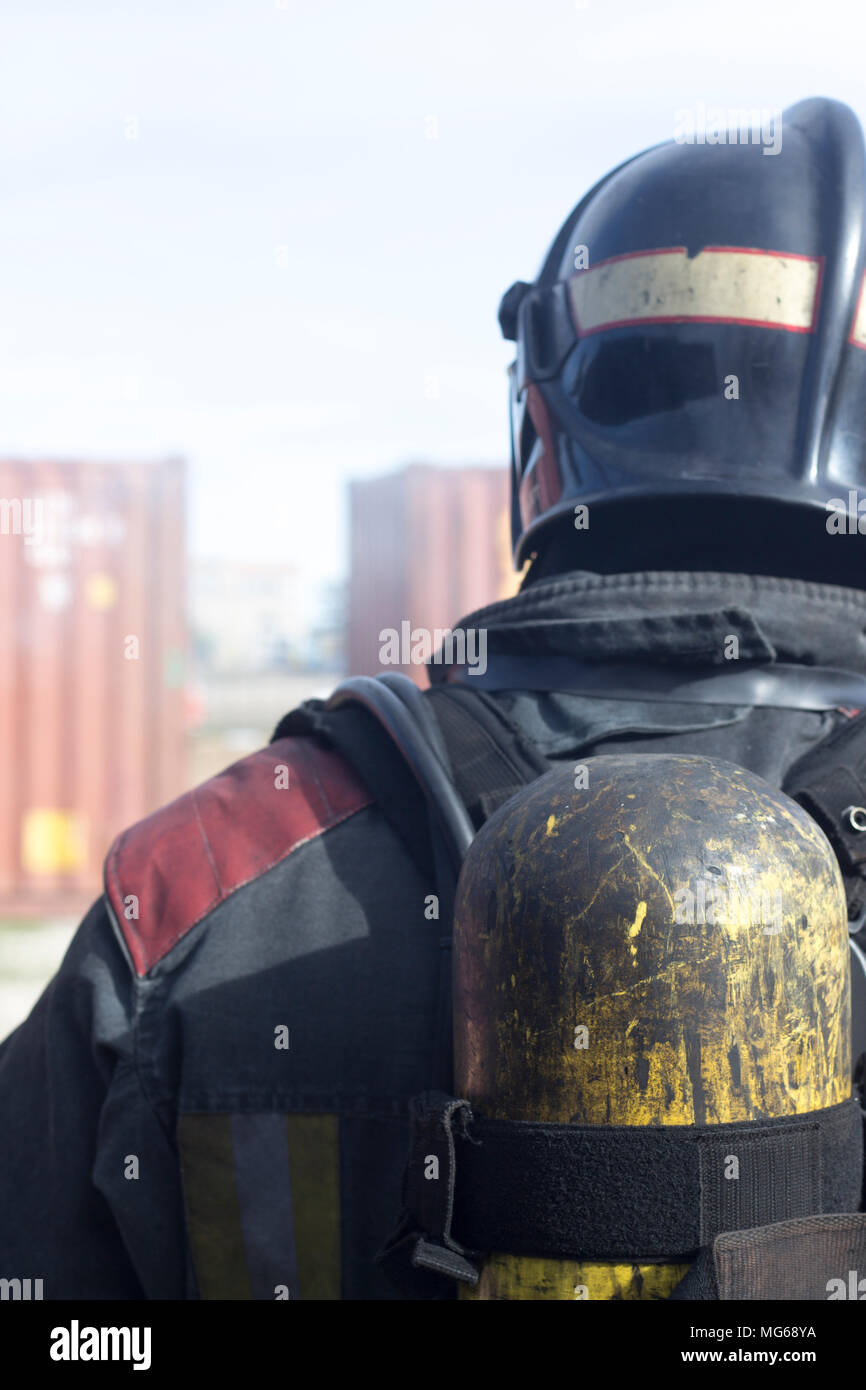 Firefighter putting out fire training station extinguisher backdraft ...