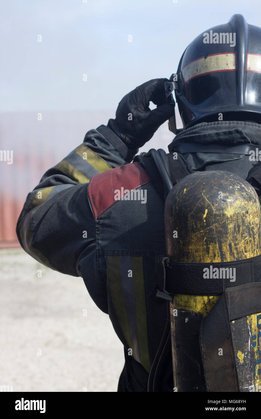 Firefighter putting out fire training station extinguisher backdraft ...