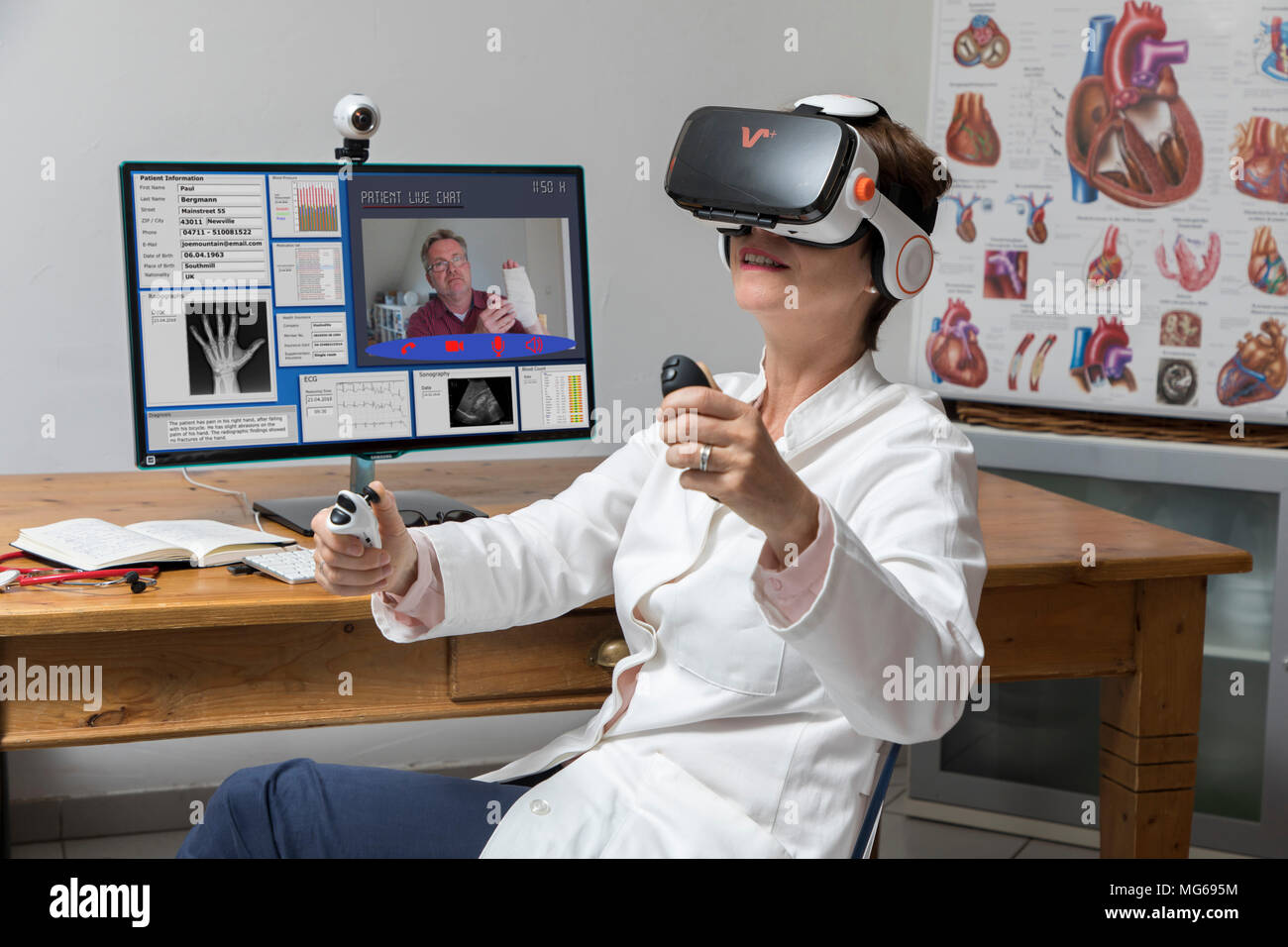 Symbolic photo of telemedicine, a female doctor in a doctor's office ...