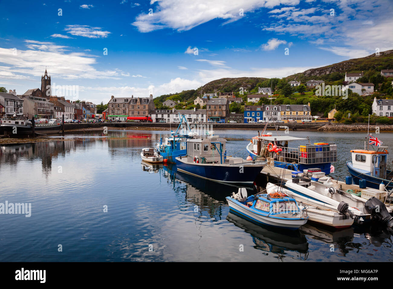 Moored boats at Tarbert Harbour. Tarbet, a small fishing town and ferry ...