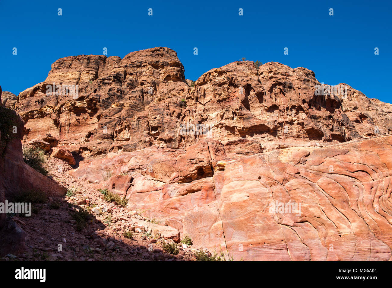 Beautiful red rock formations in Petra (Rose City), Jordan. Petra is ...
