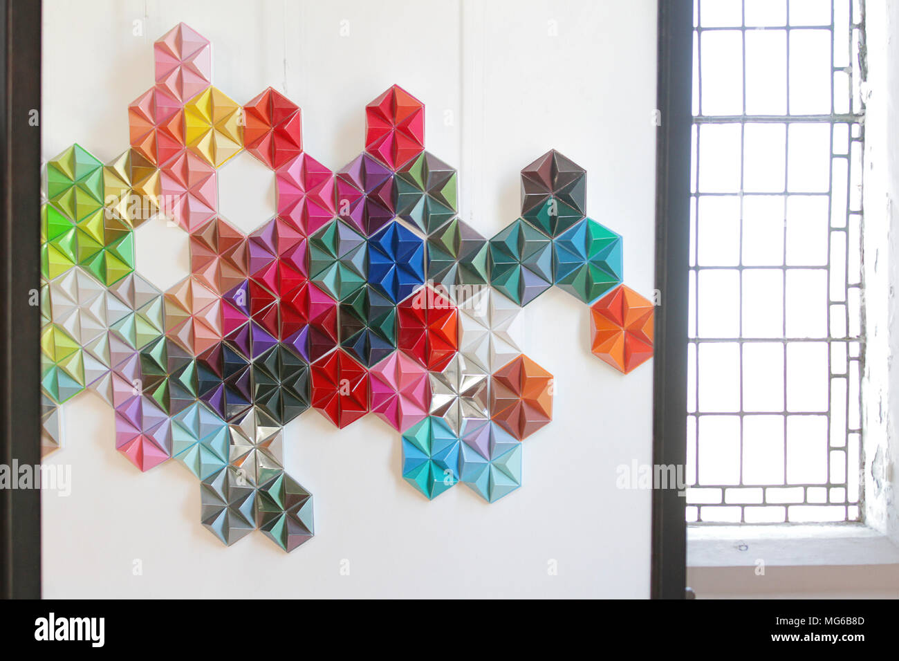 Contemporary 3D wall art of colourful polyhedrons Stock Photo - Alamy