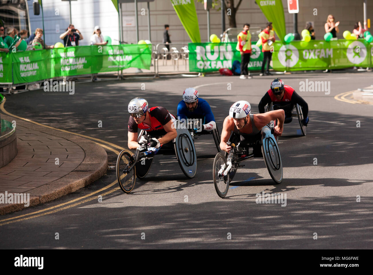 Marcel Hug,, George Joshua, Jordi Madera and Hiroki Nishida, racing in ...