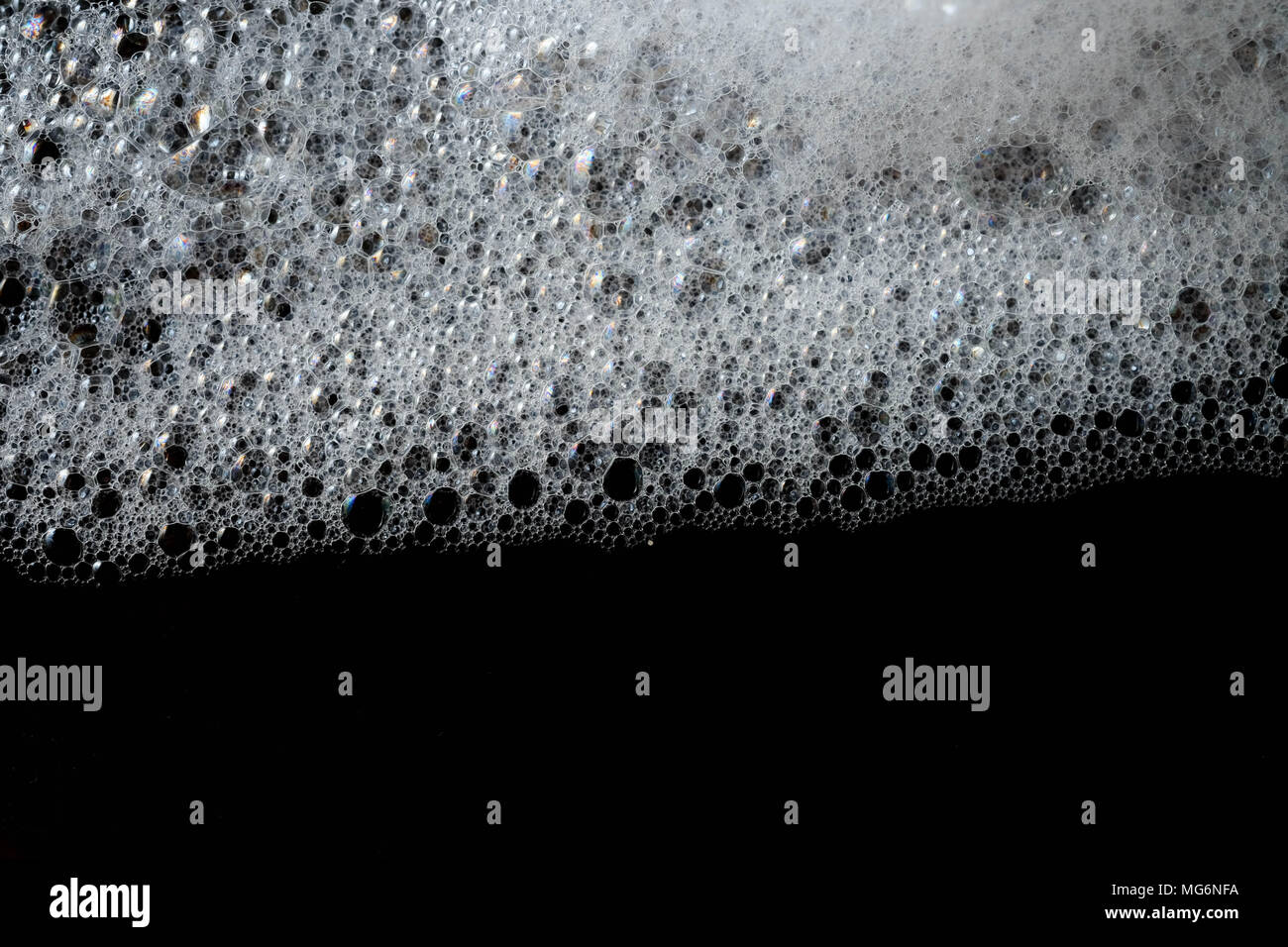 Abstract background white soapy foam texture. Shampoo foam with bubbles ...