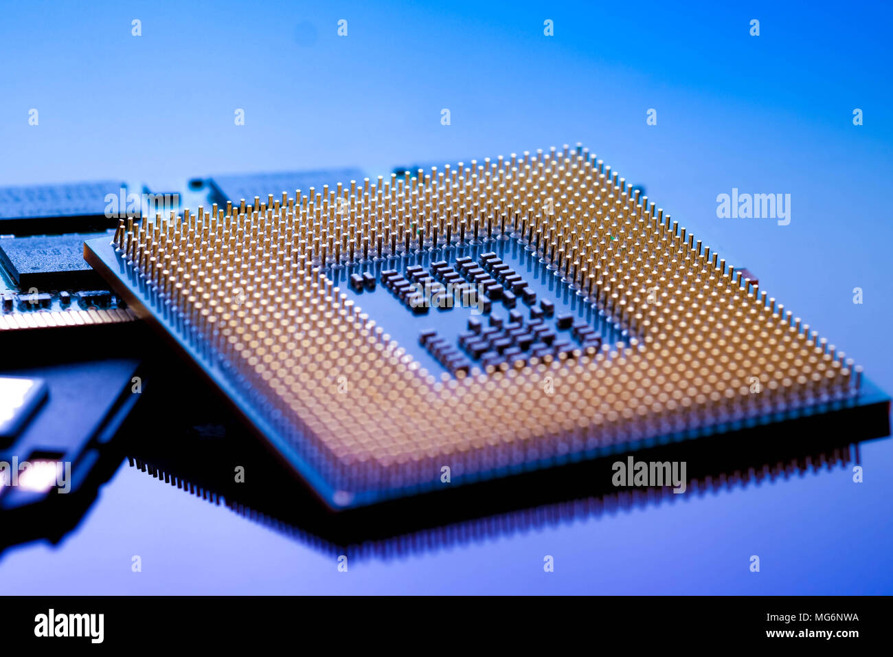 technology cyber electronic concept. cpu ram computer on blue light ...